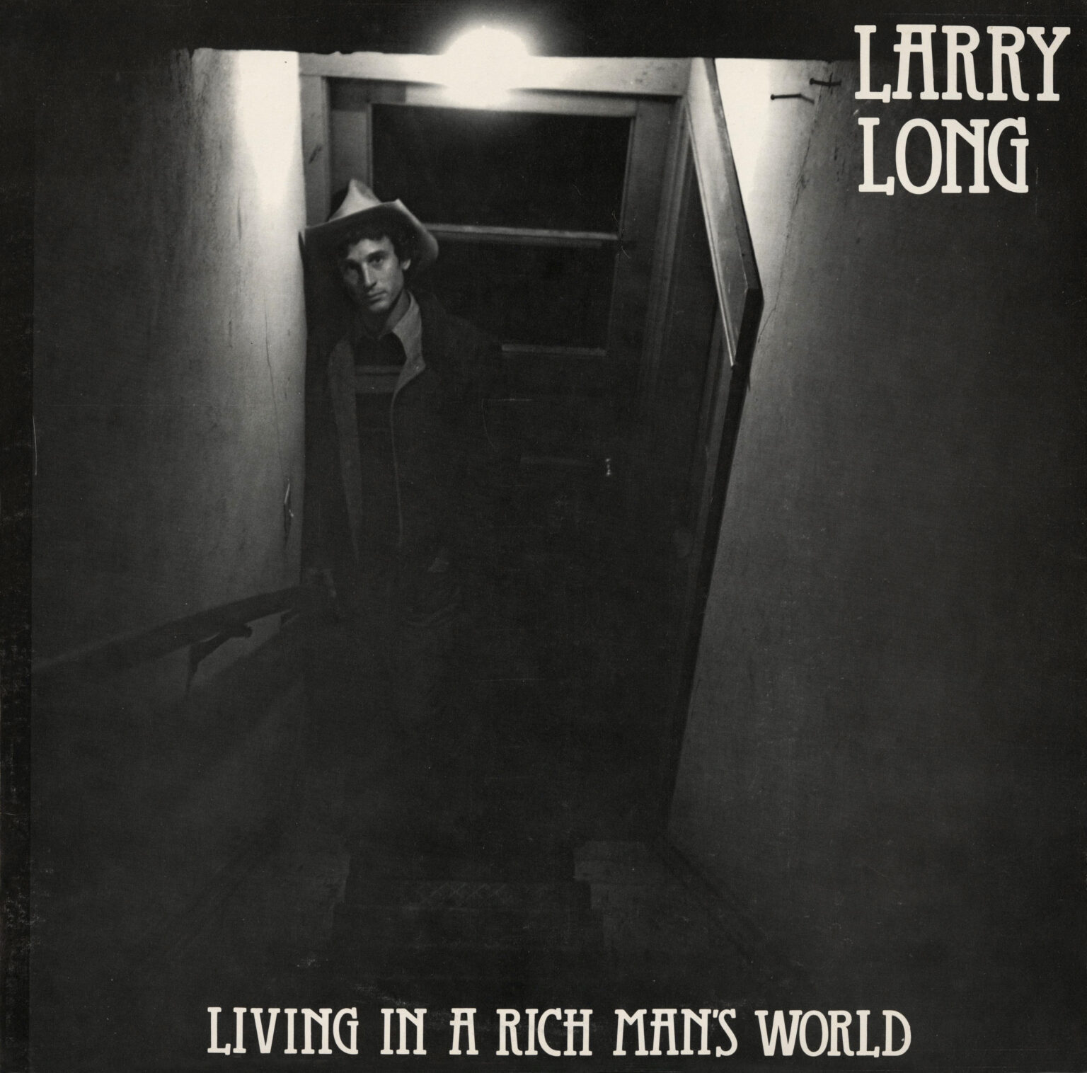 Living In A Rich Man’s World – Larry Long